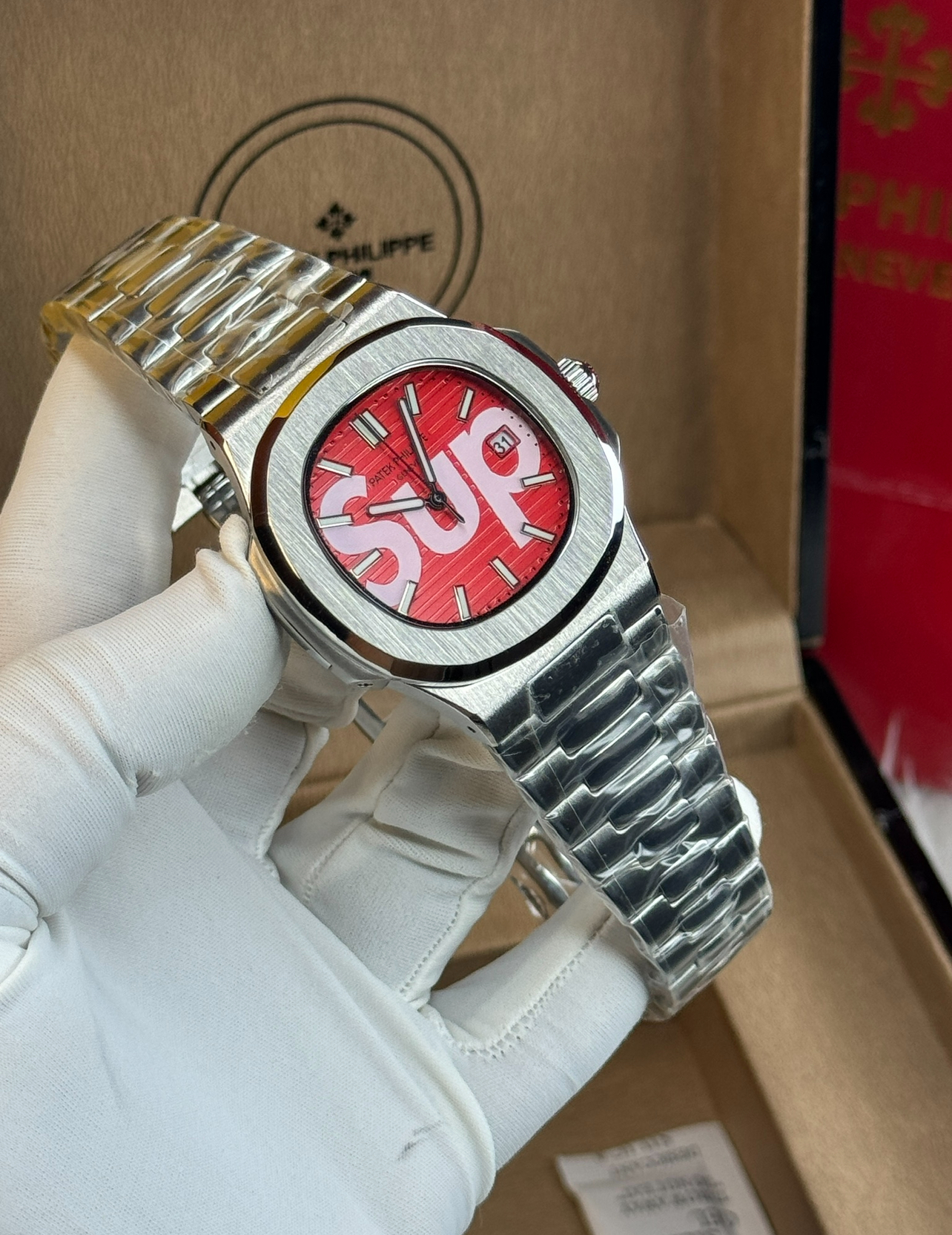 Patek Philippe Nautilus “Sup” Red Dial — Euro Grade – Timeless Tastes